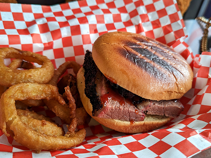 A brisket sandwich that makes all other sandwiches seem like mere practice runs. Those onion rings aren't just sides&mdash;they're golden halos of deliciousness.