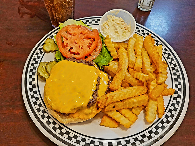 A cheeseburger that doesn't need a fancy name or exotic toppings &ndash; just honest beef, melted cheese, and the satisfaction of tradition done right.