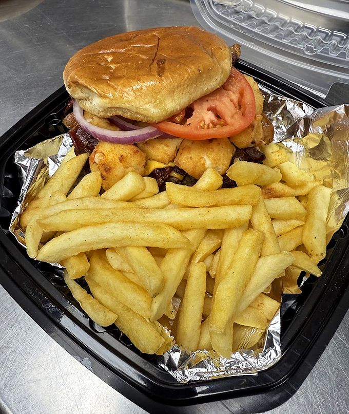 A burger and fries combo that looks like it stepped right out of a Norman Rockwell painting.