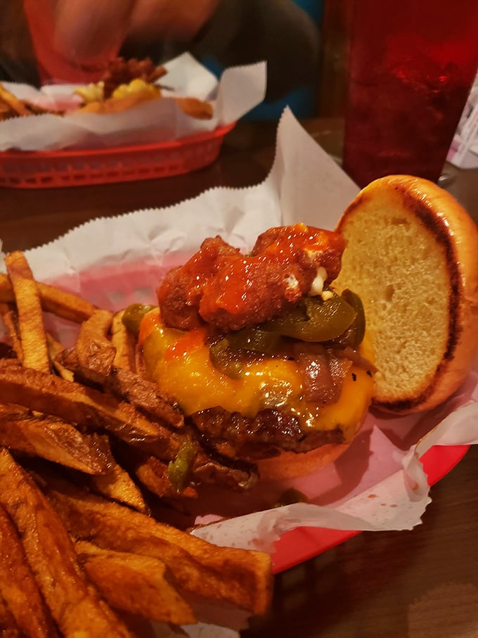 Cheese curds and special sauce crown this burger masterpiece &ndash; proof that sometimes more is exactly the right amount.