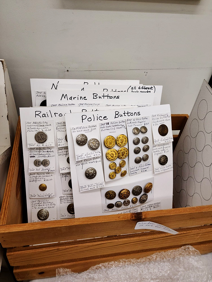 Not just buttons but tiny metal time capsules&mdash;each one once part of a uniform that witnessed history in the making.