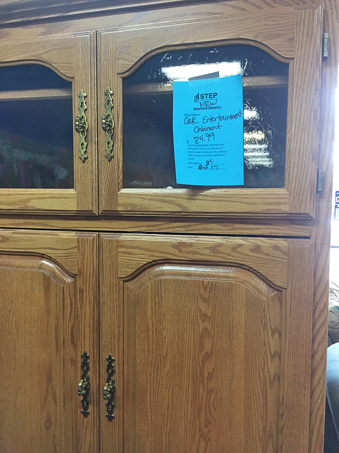 Solid oak entertainment center with the kind of craftsmanship that makes modern furniture look like it's made from cardboard and wishes.