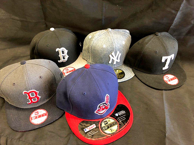 Baseball cap heaven for sports fans&mdash;representing team loyalties that might start friendly arguments in any Texas sports bar.
