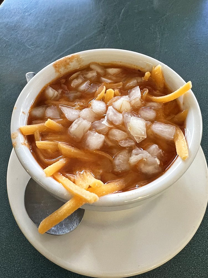 Not just chili, but a warm hug in a bowl. Those French fries aren't lost&mdash;they're exploring new flavor territory.