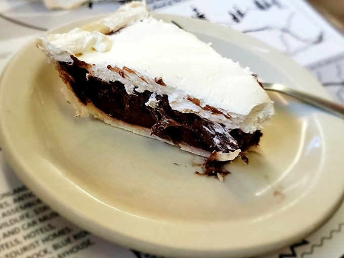 Chocolate pie with a cloud of whipped cream that makes you understand why people write songs about dessert. One bite and you'll be planning your next visit.