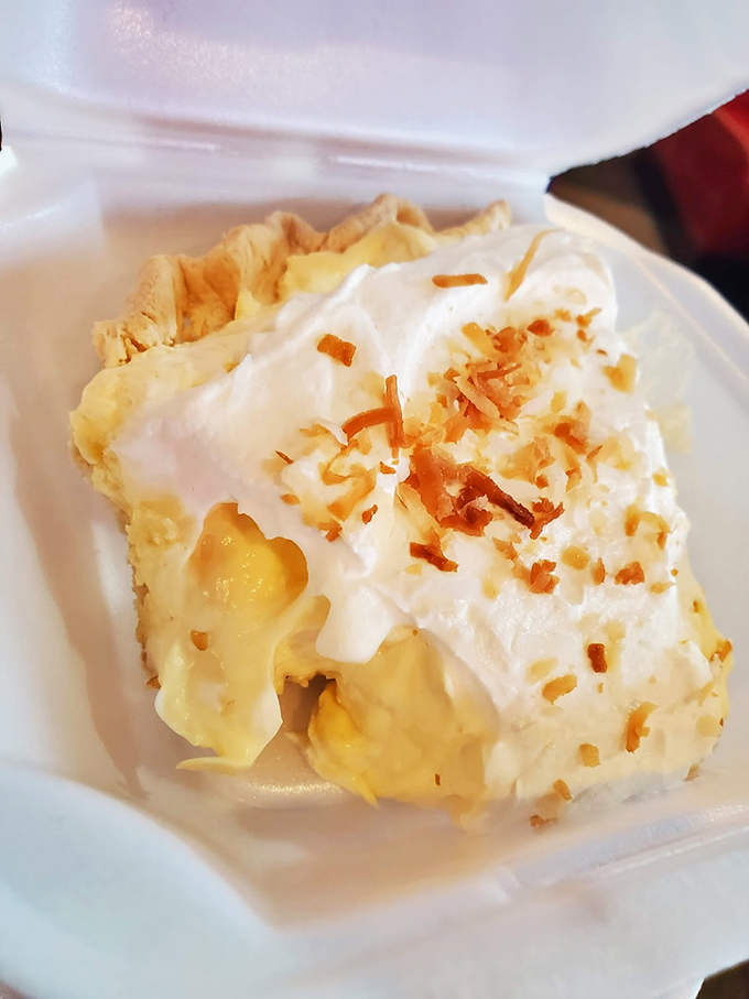 Coconut cream pie so perfect it could end family feuds. That toasted coconut sprinkle on top isn't decoration&mdash;it's the crown jewel.