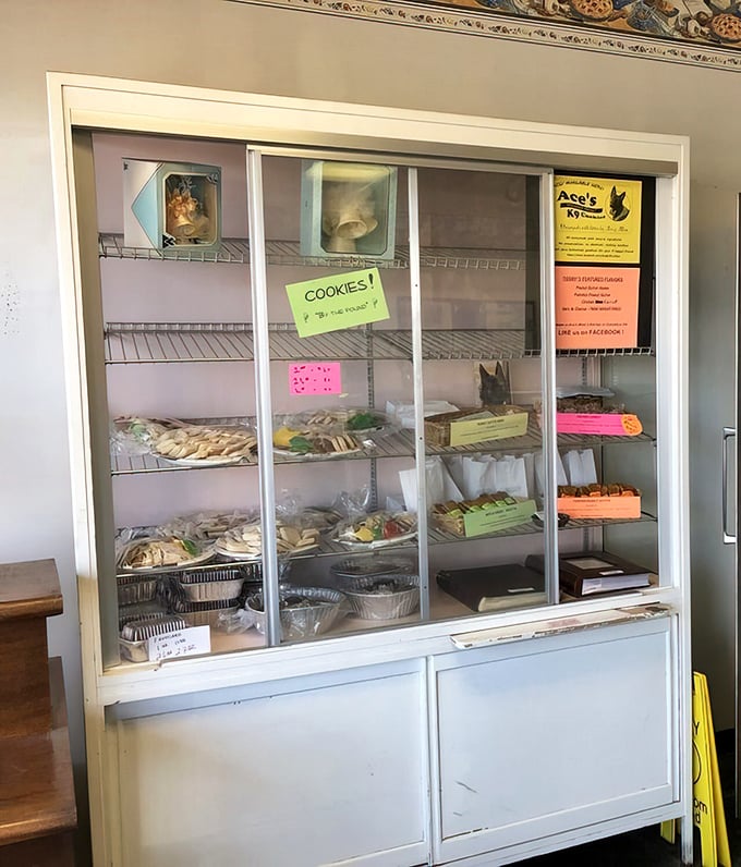 The cookie case offers a lineup of usual suspects, their handwritten labels and no-nonsense presentation suggesting recipes unchanged for generations.