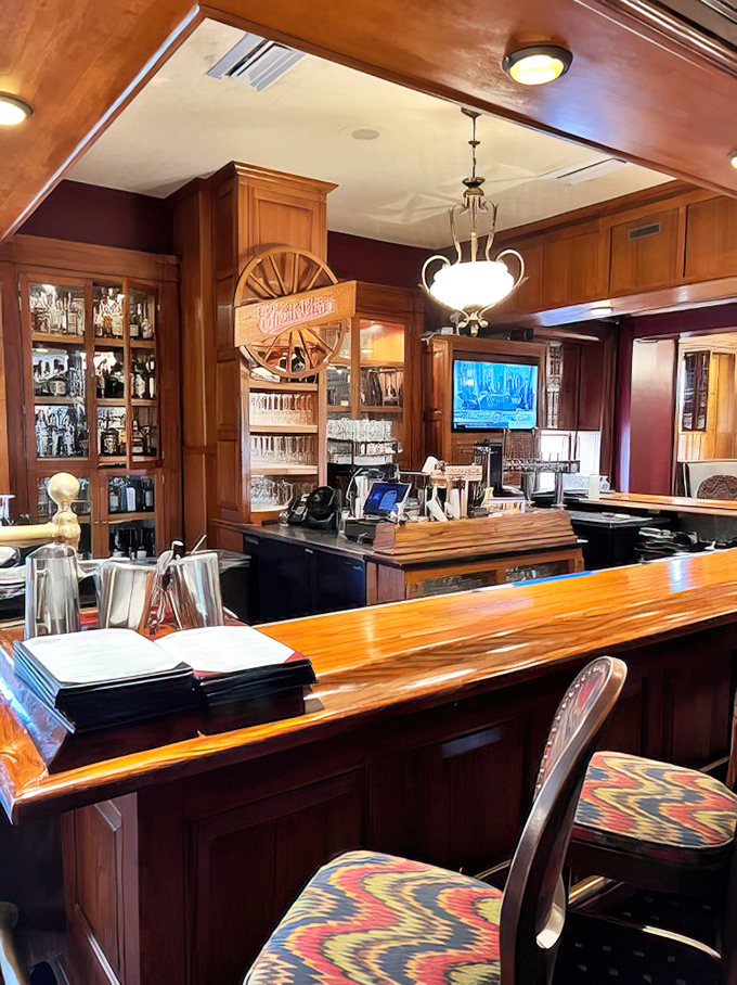 A bar crafted from gleaming wood that's witnessed decades of toasts, confessions, and celebrations – if only it could publish its memoirs.