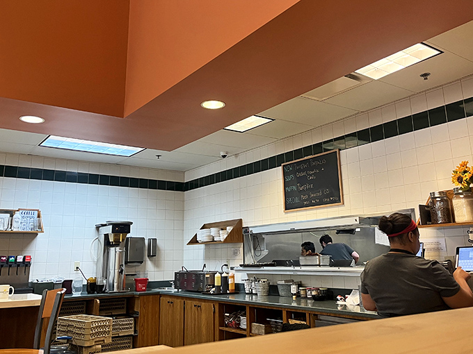 Behind the counter where the breakfast magic happens, complete with a chalkboard menu for the daily specials.