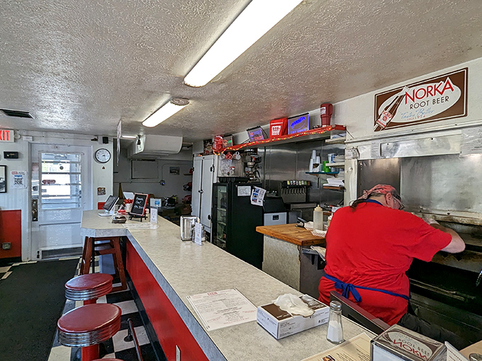 The counter offers front-row seats to hamburger theater, where every order becomes a small culinary performance.