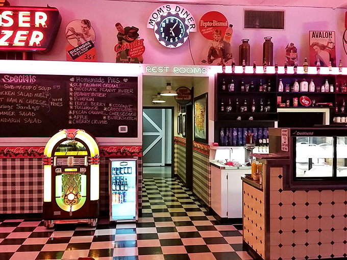 The counter view&mdash;where magic happens behind glass blocks and neon. Half diner, half museum of American food culture.