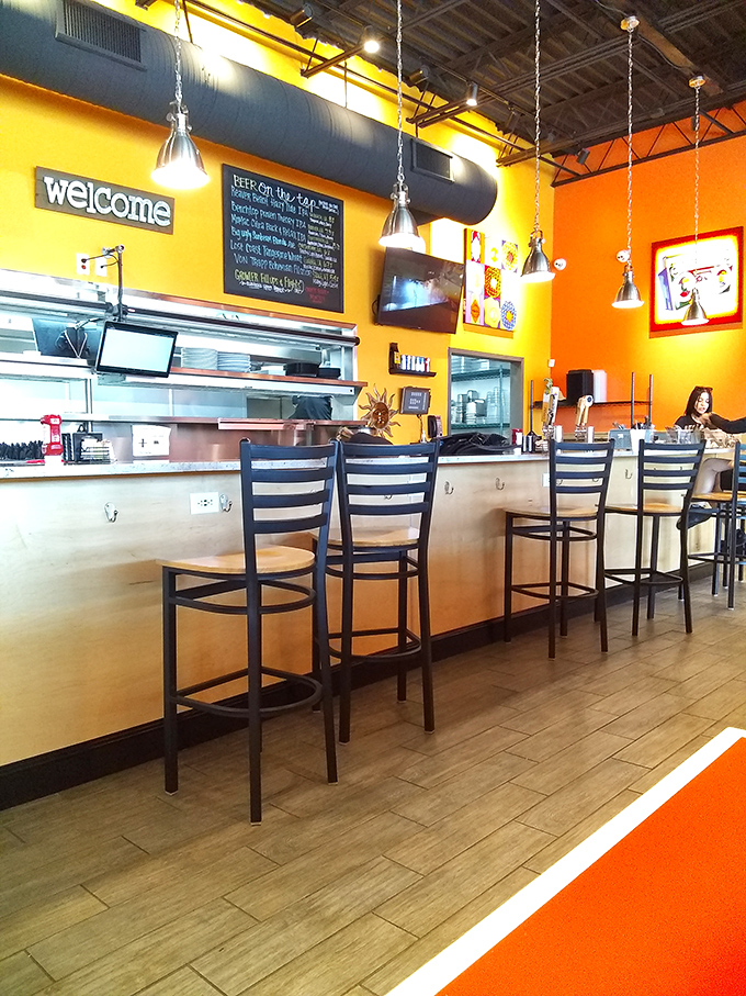 Counter seating: where solo diners become breakfast voyeurs, watching culinary magic happen in real time.