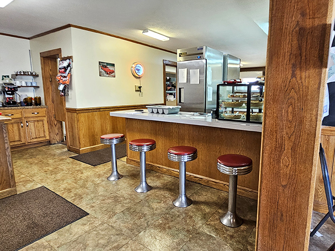 Classic counter seating where solo diners can enjoy their meal while watching the choreographed dance of short-order cooking in action.