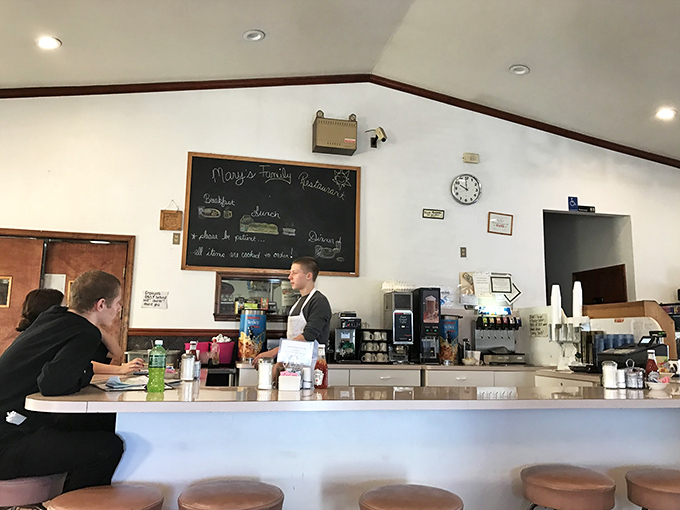 Counter seats offer front-row views of the breakfast magic happening right before your amazed eyes.