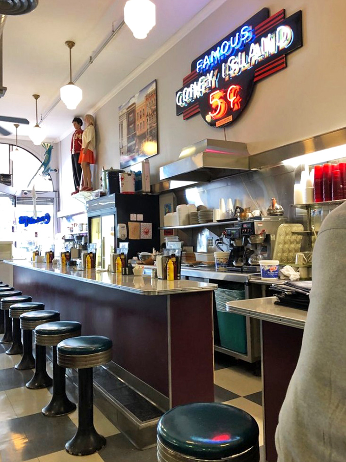Counter seating: where solo diners become temporary members of the breakfast club and short-order cooks perform culinary ballet.