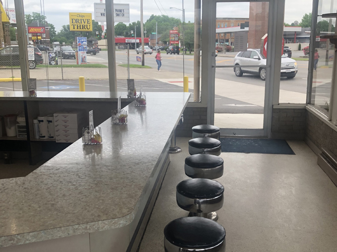 Counter seating where locals gather like old friends, sharing coffee and stories that never get old.