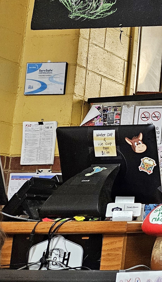Even the cash register wears stickers with pride, a small detail that speaks volumes about the personality behind the counter.