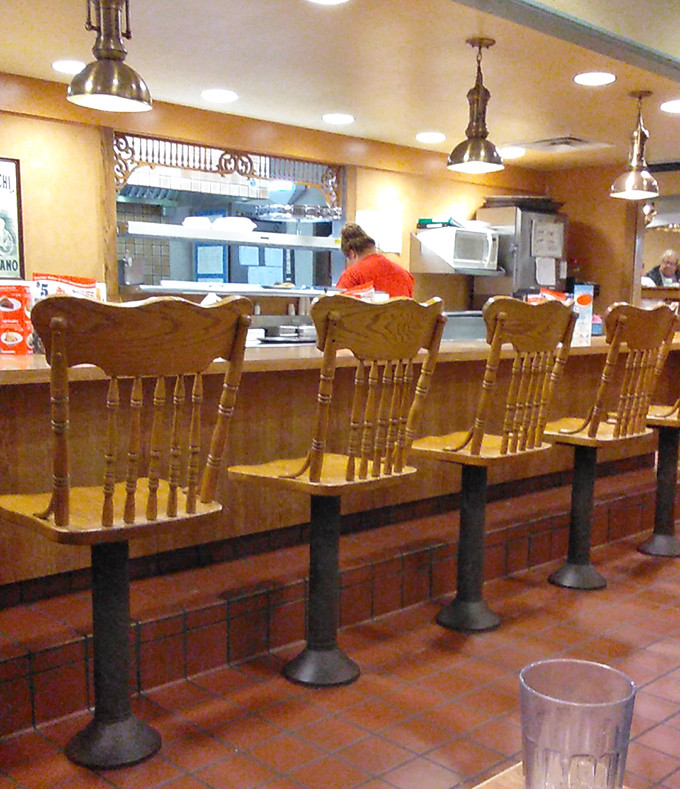 Counter seating: where solo diners become regulars and the staff eventually knows your order before you sit down.