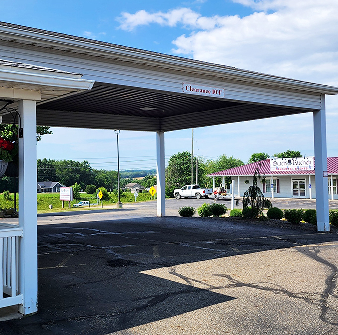 The covered entrance welcomes visitors rain or shine, a practical touch that speaks to the no-nonsense Amish influence.