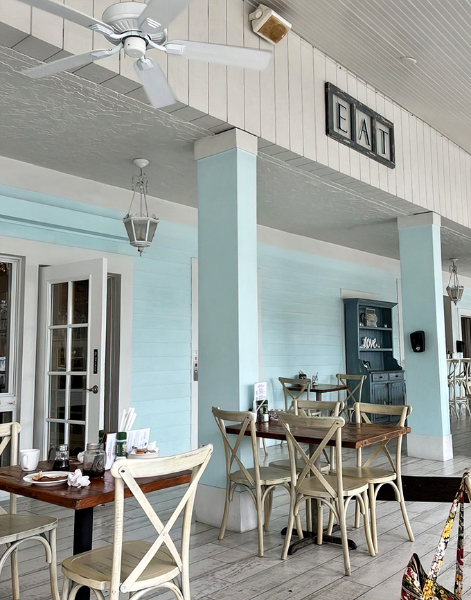Patio seating that makes indoor dining seem like a rookie mistake. Those cross-back chairs have supported more happy breakfasters than a therapist's couch.