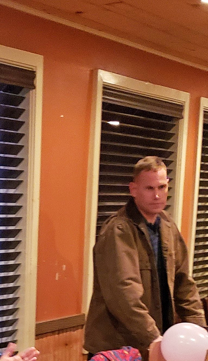 The warm interior lighting creates that magical dinner hour glow where everyone looks their best and food tastes even better.