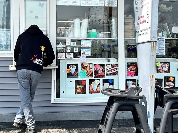 The sacred transaction at the ordering window&mdash;where summer cravings meet their match and dietary resolutions go to die.