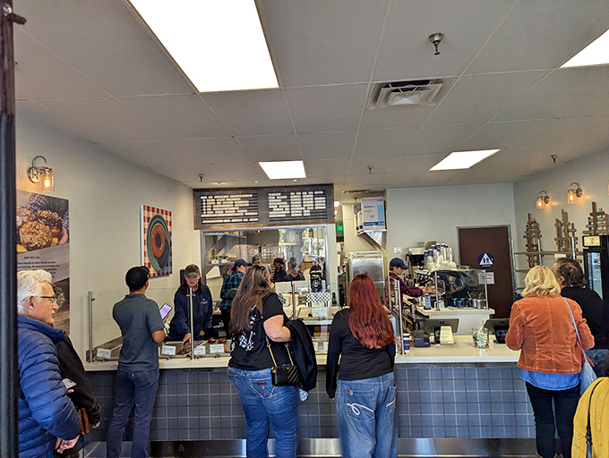 The morning pilgrimage to JD Flannel brings together locals and visitors alike, united in their quest for exceptional donuts.