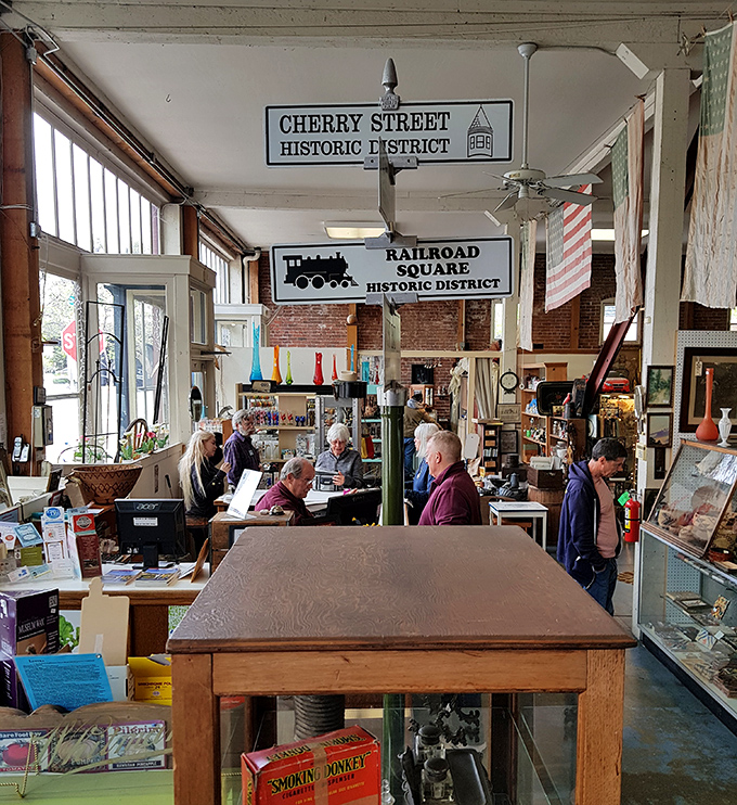 The Railroad Square Historic District sign reminds shoppers they're not just buying antiques&mdash;they're participating in preserving local history.