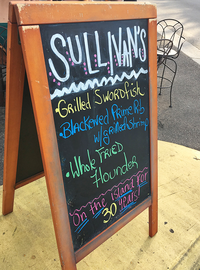 The sidewalk specials board announces today's fresh catches like a town crier of deliciousness, tempting passersby with seafood possibilities.