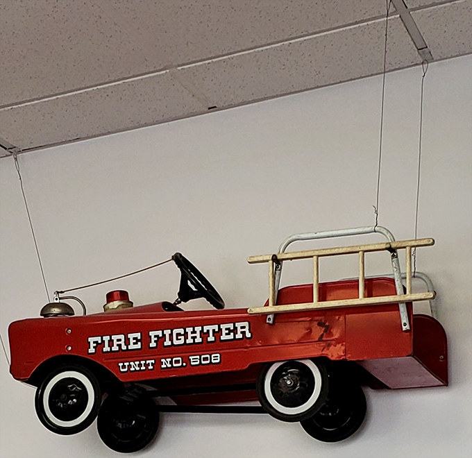The vintage fire truck dangling from the ceiling&mdash;proof that whimsy is always on the menu at Dolly's Diner.