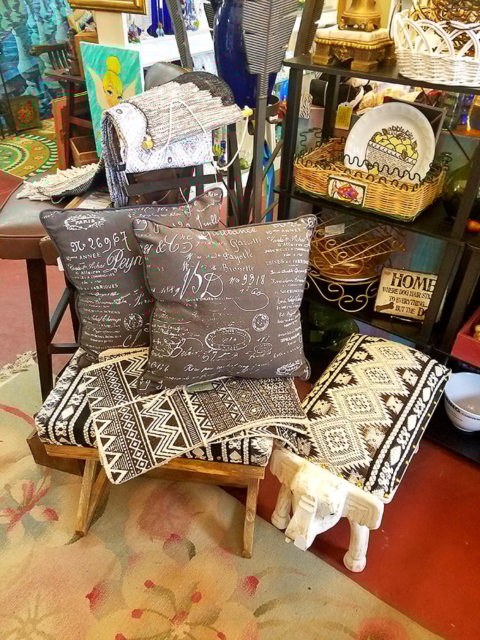 Pillows with personality lounging on furniture with history. That geometric pattern has witnessed more design trends than most interior decorators.