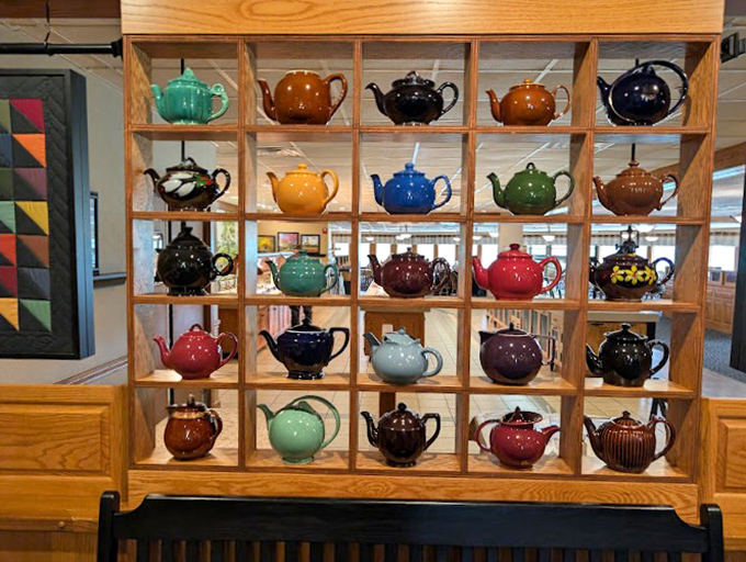 A colorful teapot display that makes you wonder if collecting is an Olympic sport in Amish country.