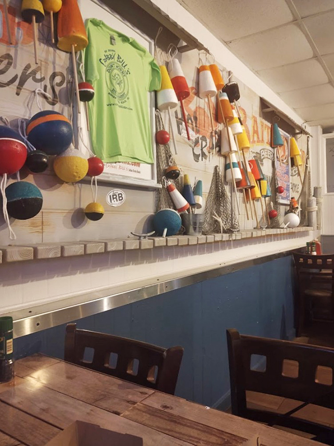Not just decoration&mdash;a maritime history lesson on the walls. These colorful buoys and fishing memorabilia tell stories that pair perfectly with fresh catch.