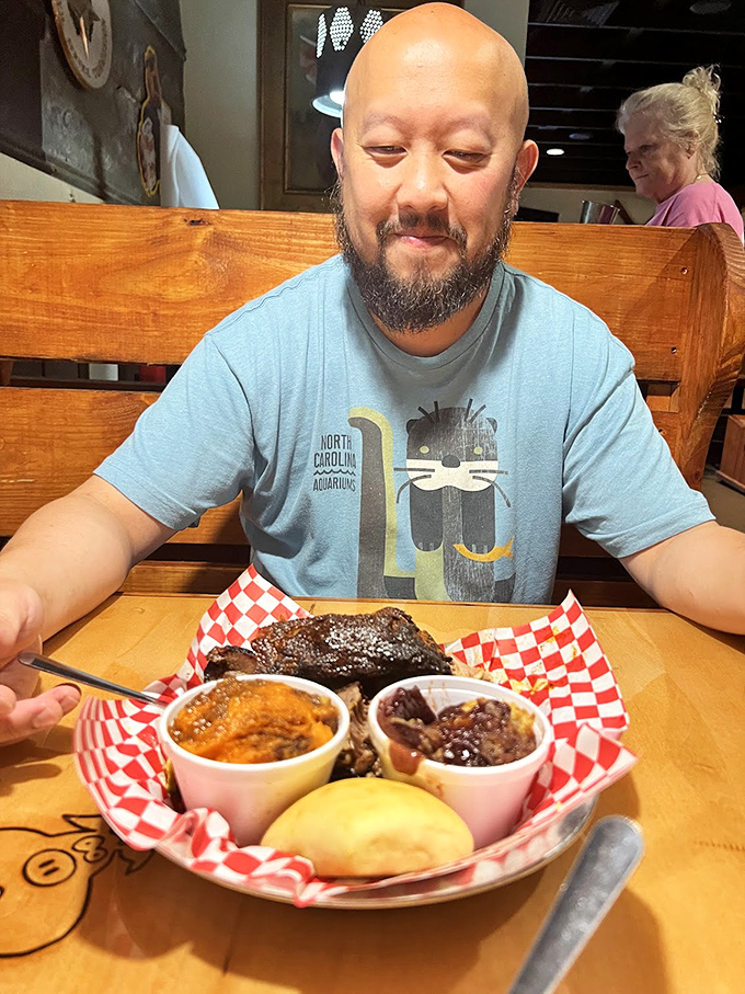 That moment when you're about to dive into barbecue nirvana. The smile says it all&mdash;resistance is futile.