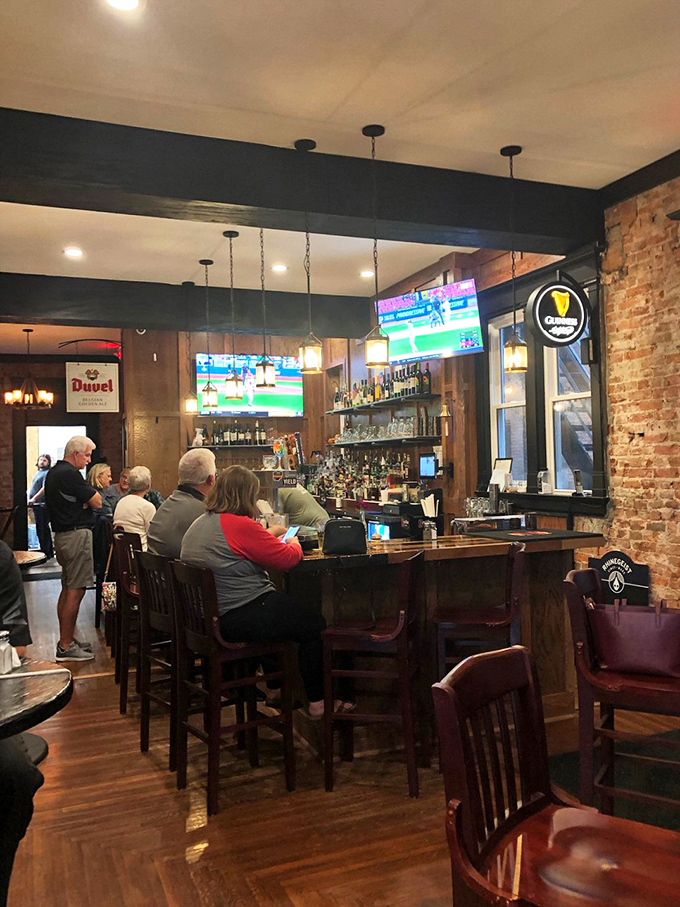 The bar area buzzes with locals who've discovered what visitors drive miles to experience&mdash;community served alongside excellent drinks.