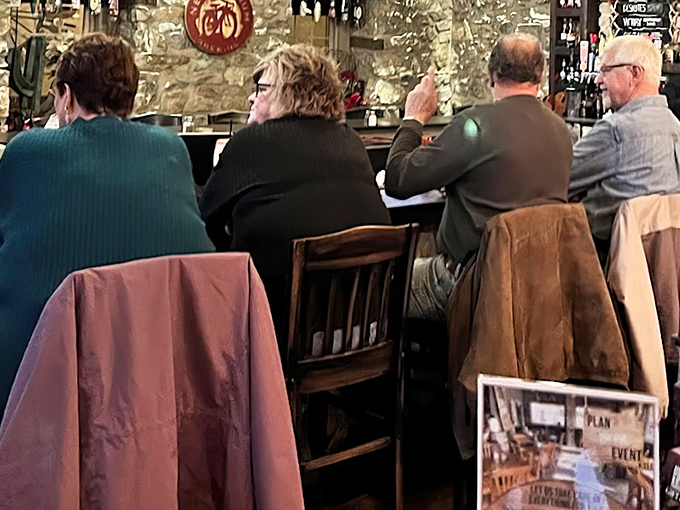 The bar attracts locals who've been solving the world's problems over drinks here since before smartphones ruined good conversation.