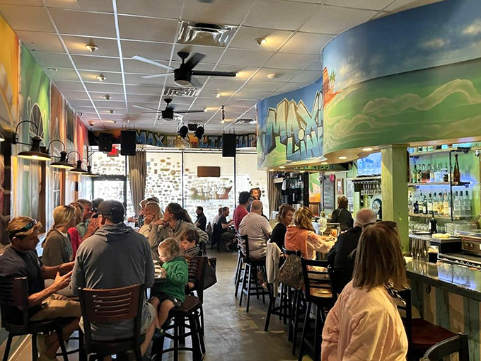 Happy diners share the universal language of exceptional food, faces glowing with pure culinary satisfaction.