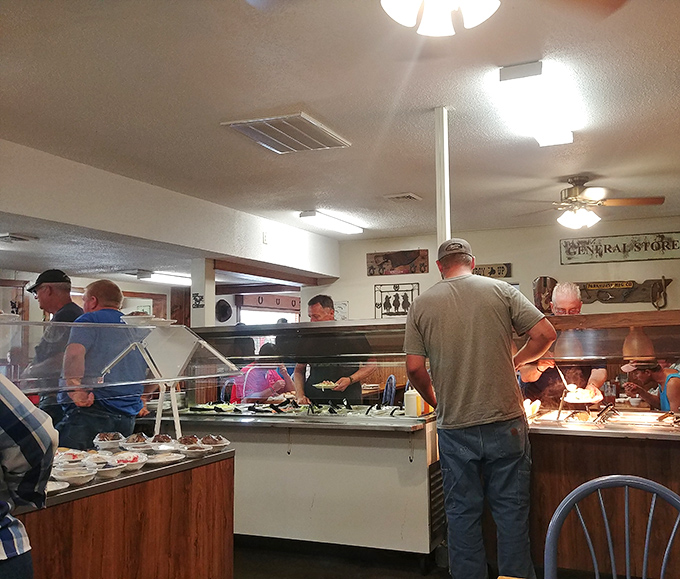 The buffet in action&mdash;where locals demonstrate the art of plate-loading with the precision and focus of Olympic athletes.