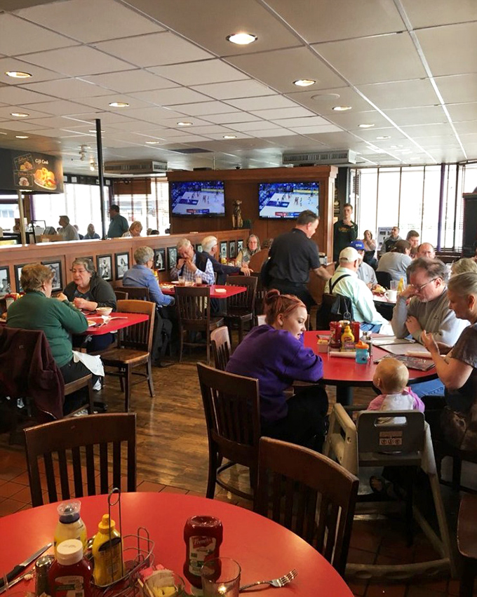 The bustling dining room where strangers become friends over shared appreciation of comfort food—and possibly shared dessert recommendations.