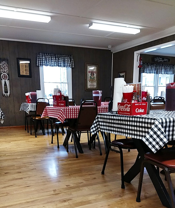 A dining room that says "stay awhile" without having to say a word. Those checkered tablecloths have witnessed countless barbecue epiphanies.