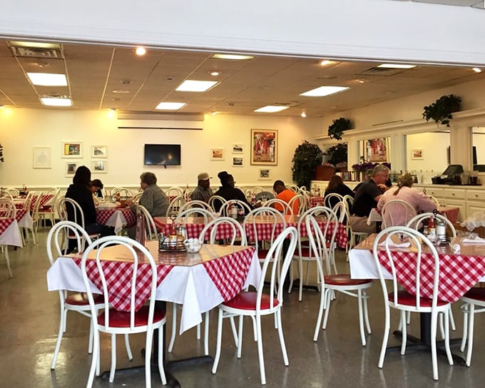 Classic diner charm with those red-checkered tablecloths &ndash; like stepping into a Norman Rockwell painting where the food actually tastes amazing.