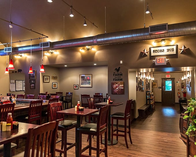 The dining area feels like the great room of a mountain lodge where everyone's welcome and nobody's rushing. Those wooden chairs have heard countless happy sighs.