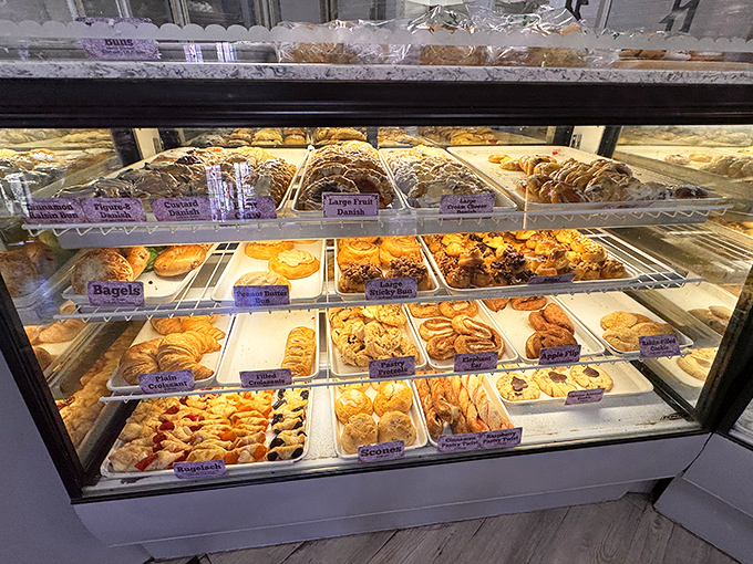 Display cases filled with pastries so beautiful they deserve their own museum exhibit, yet taste even better than art.