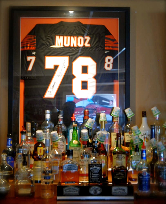 That framed Mu&ntilde;oz jersey isn't just decor&mdash;it's Cincinnati sports history watching over your drinking adventures.