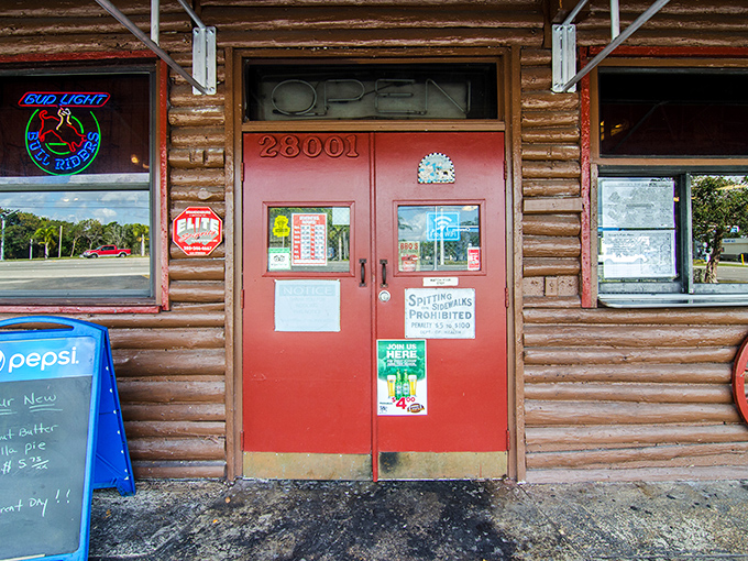 Those red doors aren't just an entrance to a restaurant—they're a portal to a world where smoke and time create magic.