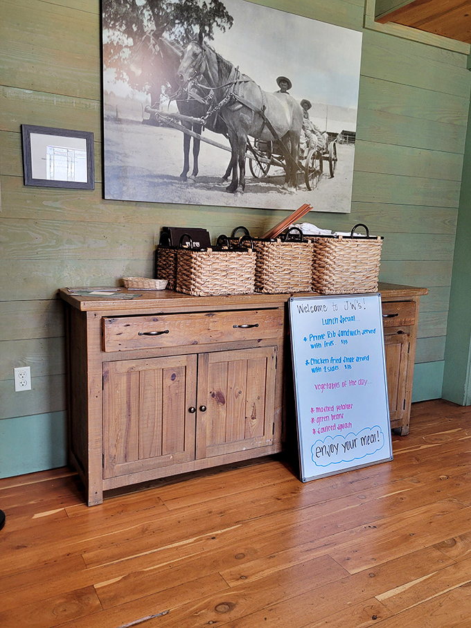 Rustic charm meets thoughtful hospitality at the entrance, where vintage photos remind you of Texas's deep roots.
