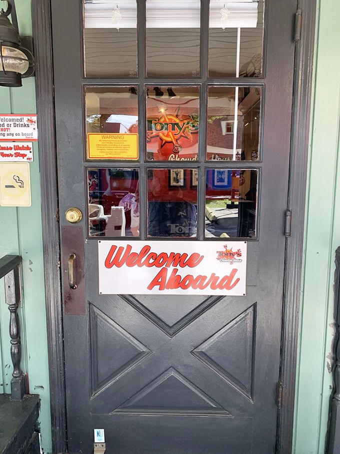 The entrance door with its "Welcome Aboard" sign sets the nautical tone immediately. Like any good voyage, what awaits inside is worth the journey.