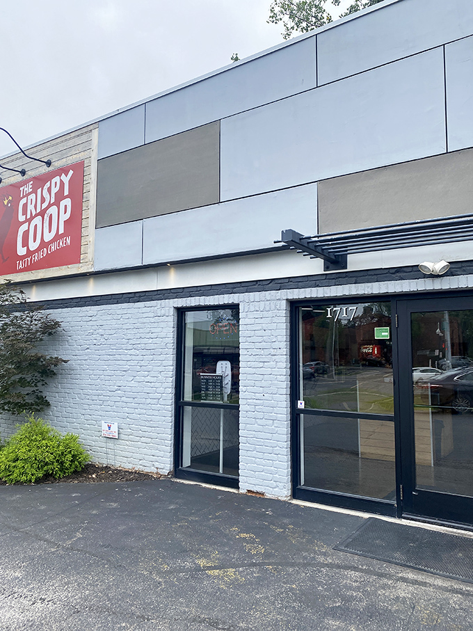 The white brick exterior and modern paneling create an unassuming presence that belies the flavor explosion waiting inside.