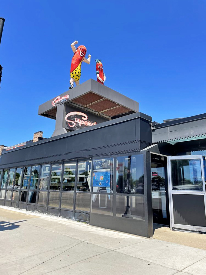 Even on a sunny day, those neon signs promise to glow later, like beacons guiding hungry Chicagoans home to comfort food paradise.
