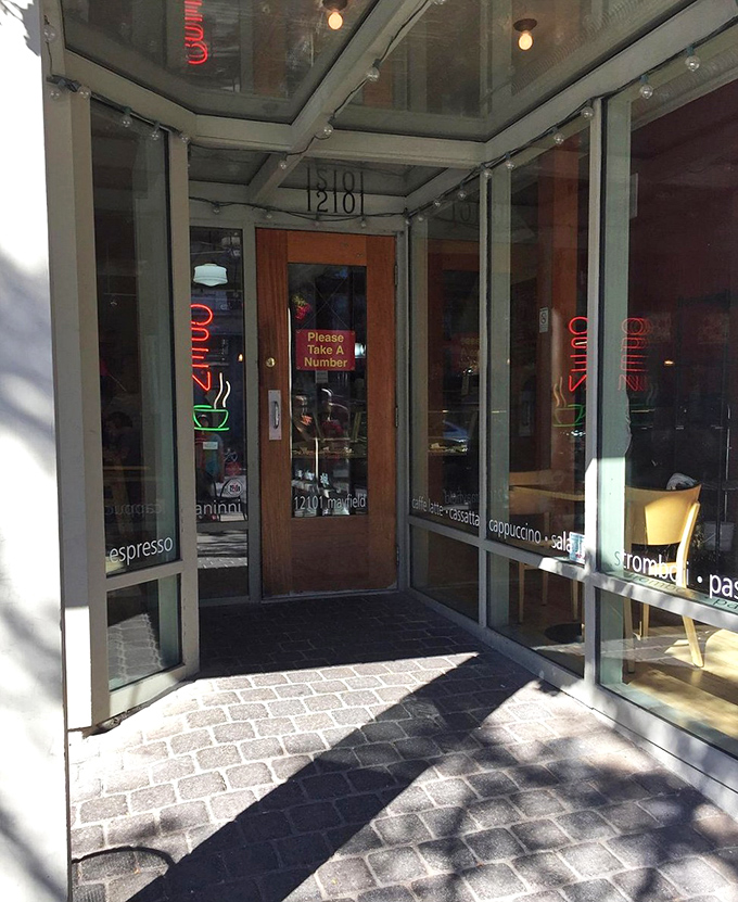 The entrance to Presti's promises coffee, pastries, and the distinct possibility that you'll exit with more treats than you planned to buy.